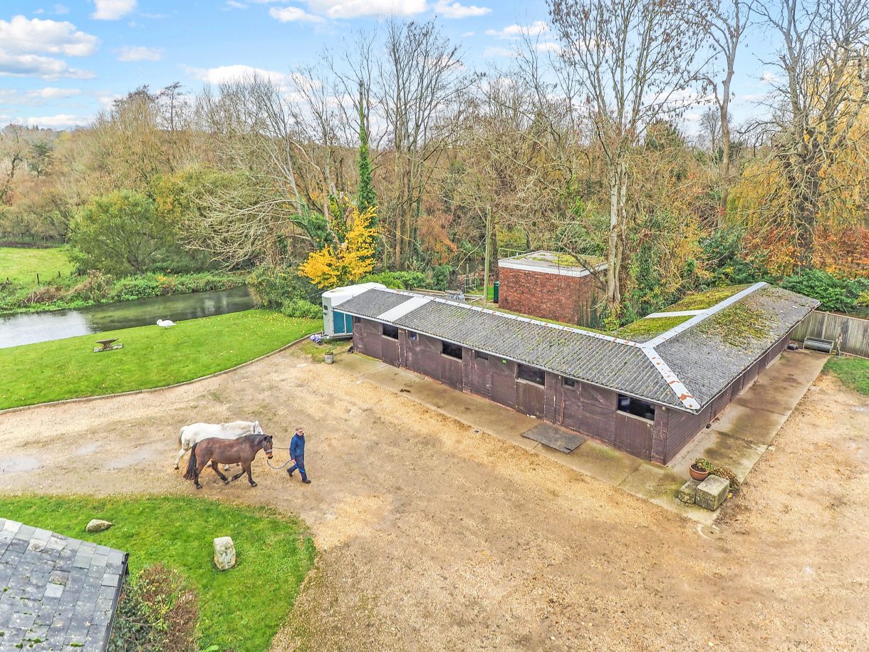 A Grade II-Listed barn conversion with stables, 10 acres and first-rate ...