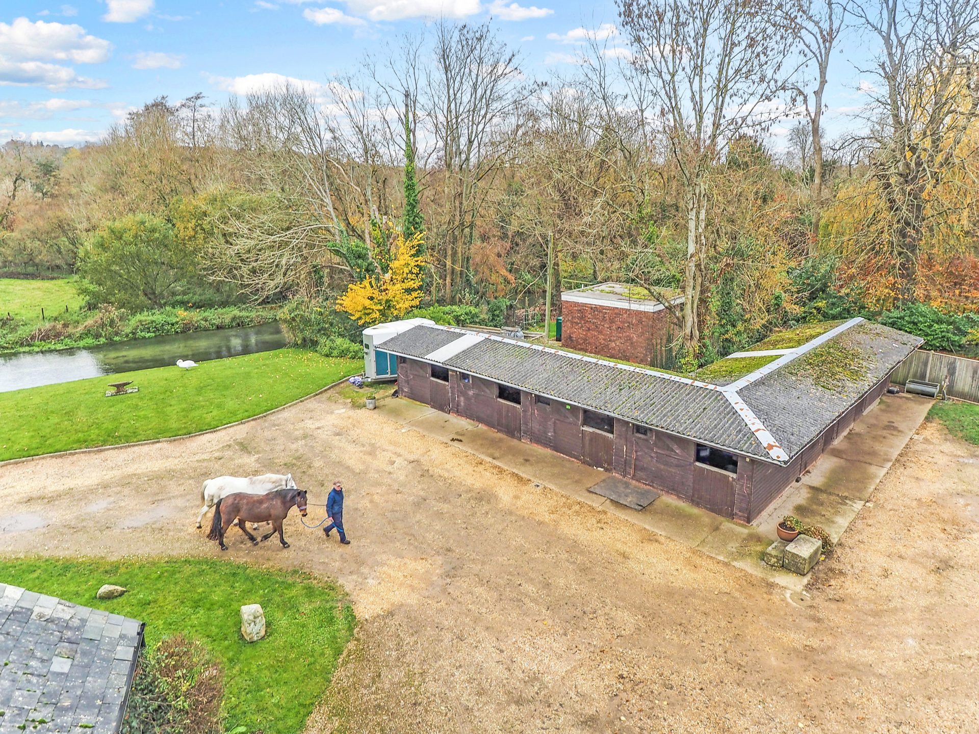 A Grade II-Listed barn conversion with stables, 10 acres and first-rate ...