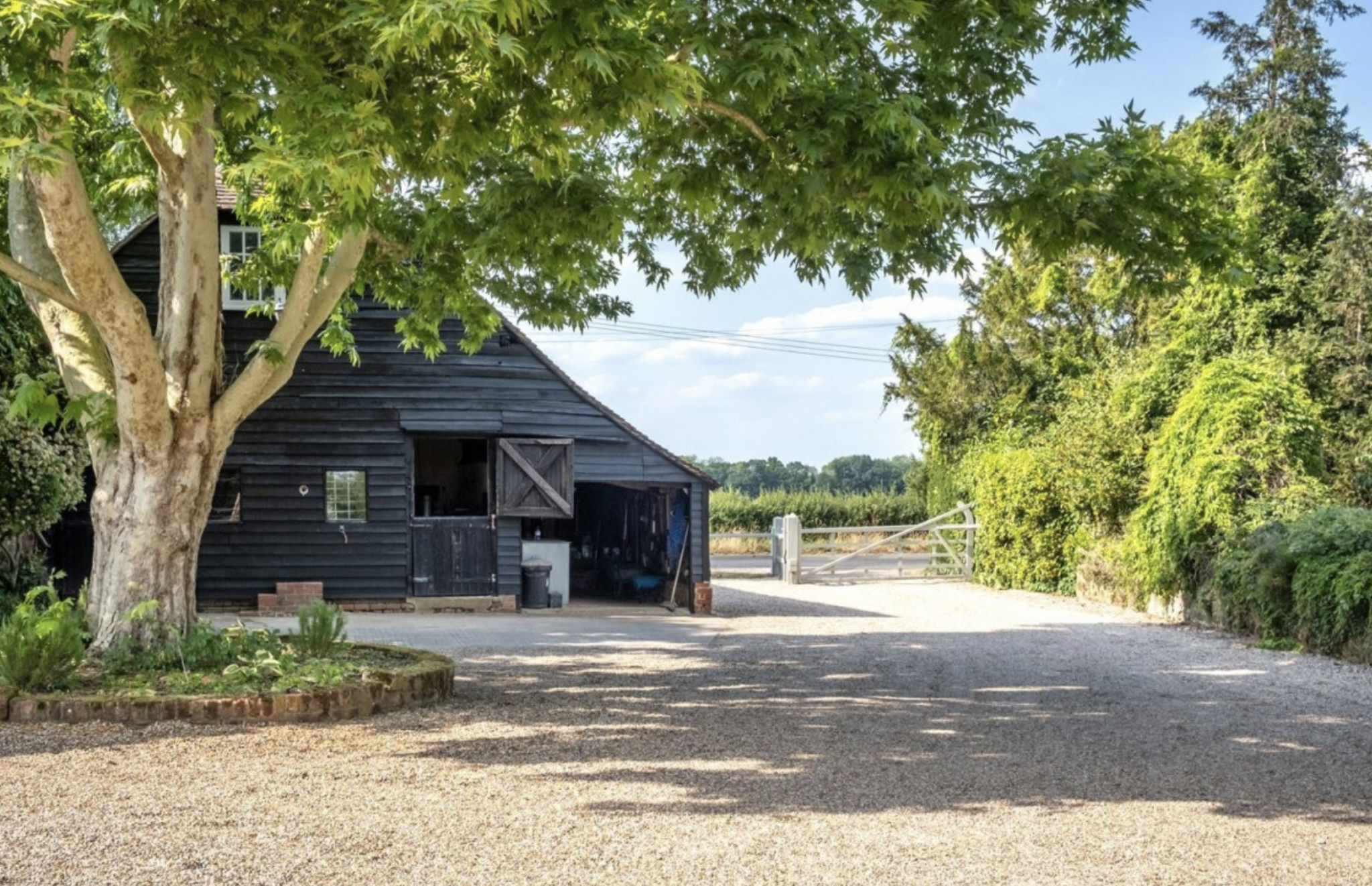 A historic equestrian home with arena, stables, over 12 acres, outdoor ...