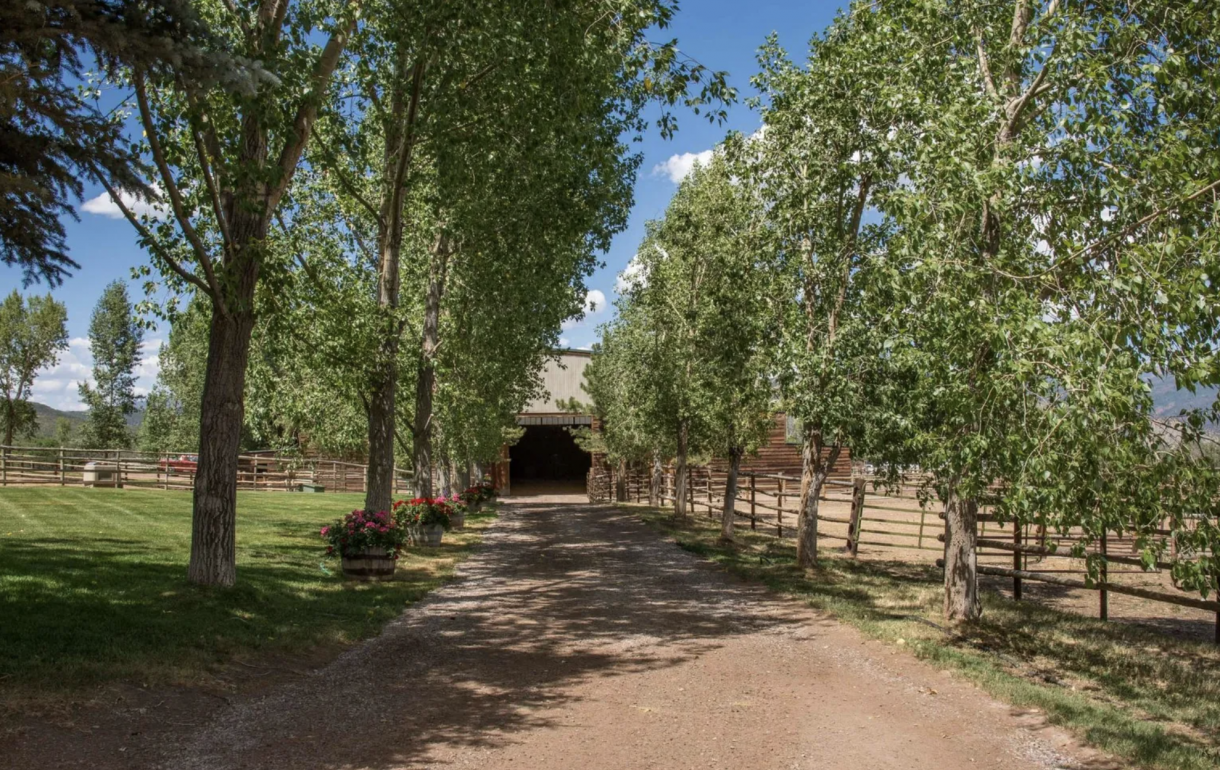 Saddle up and head to this 374-acre ranch, complete with stables ...