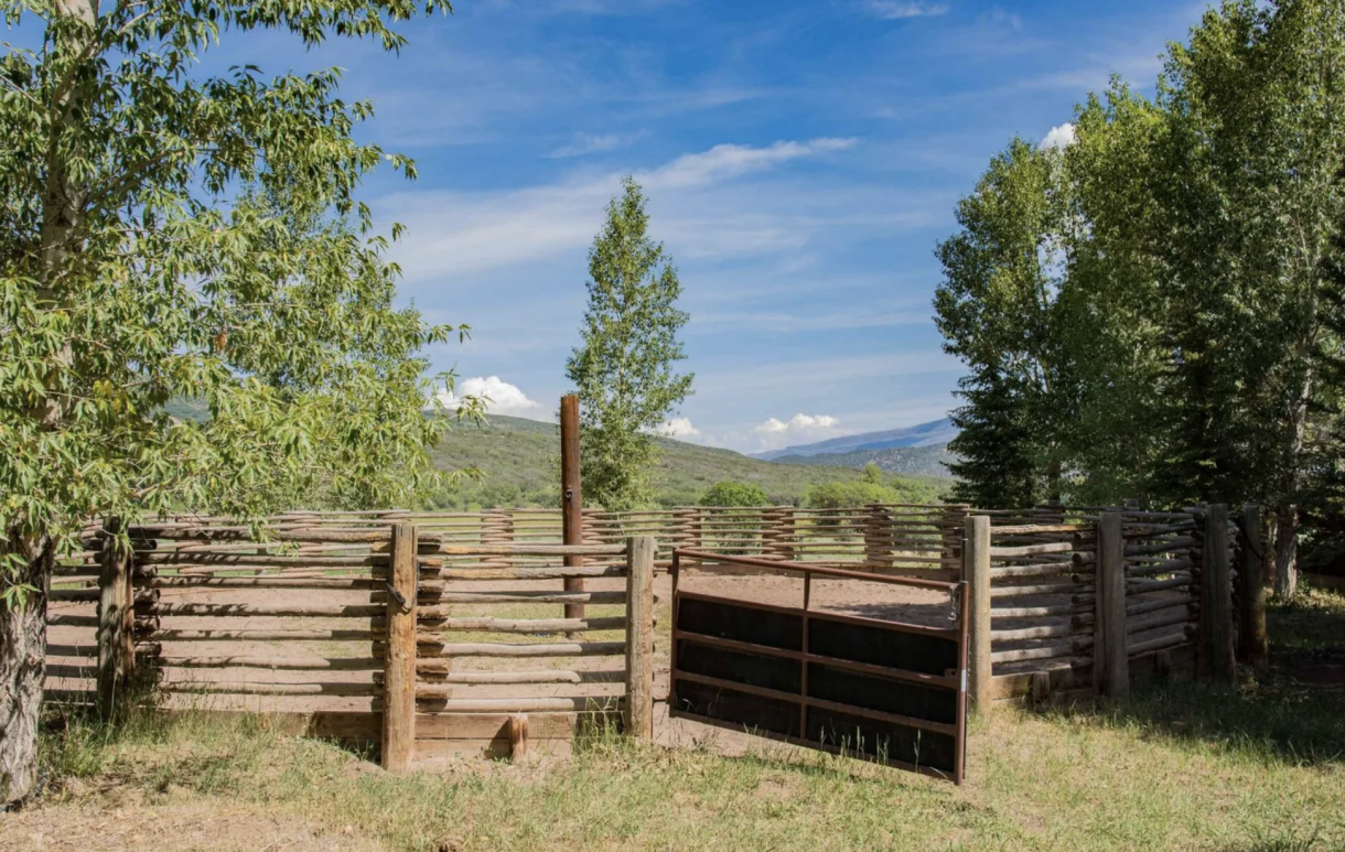Saddle up and head to this 374-acre ranch, complete with stables ...