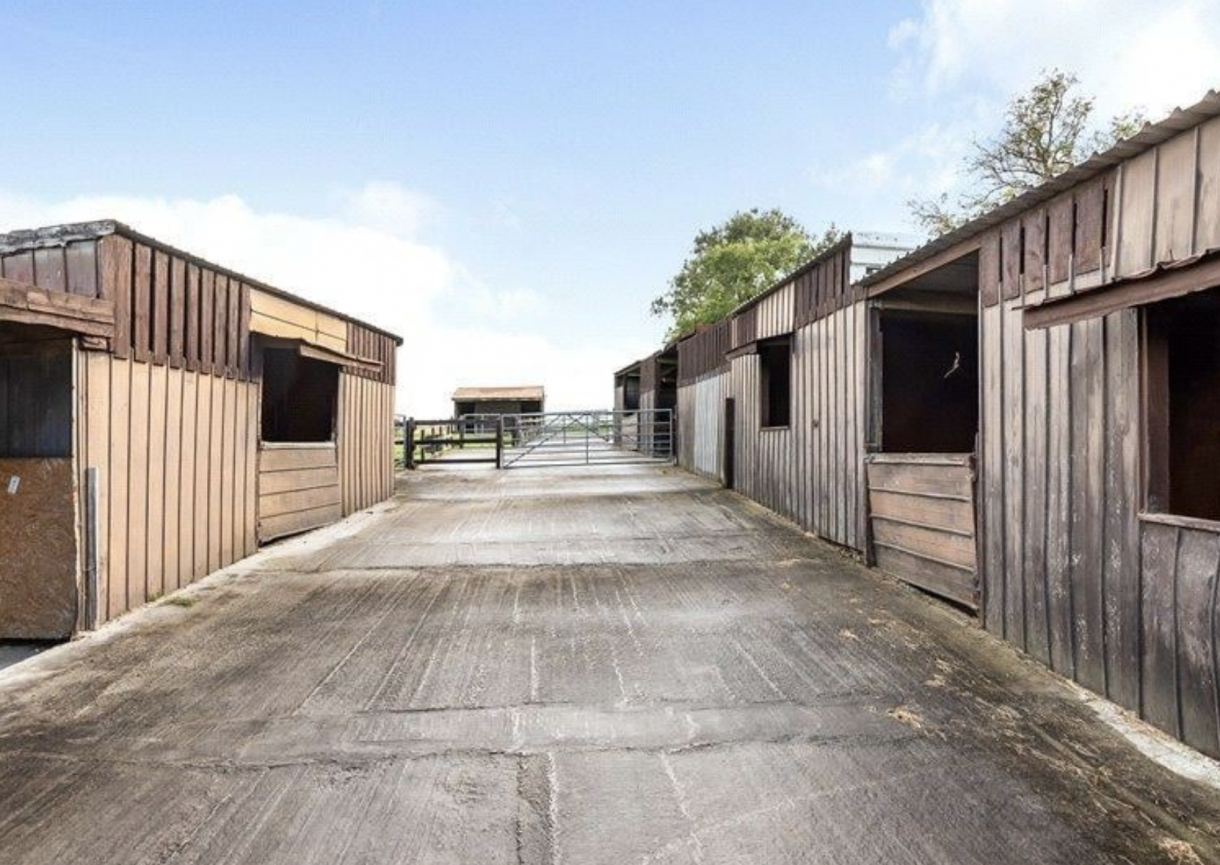 What an opportunity! A property with over 24 acres, stables and more up ...