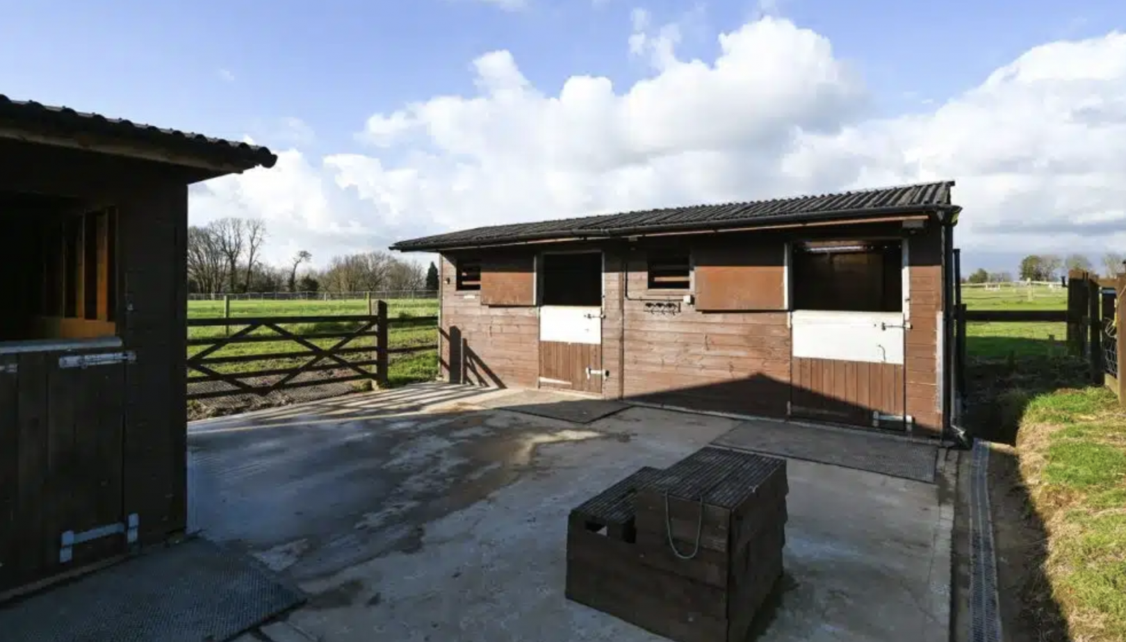 A handily-placed home with stables, arena, pool and over 14 acres could ...