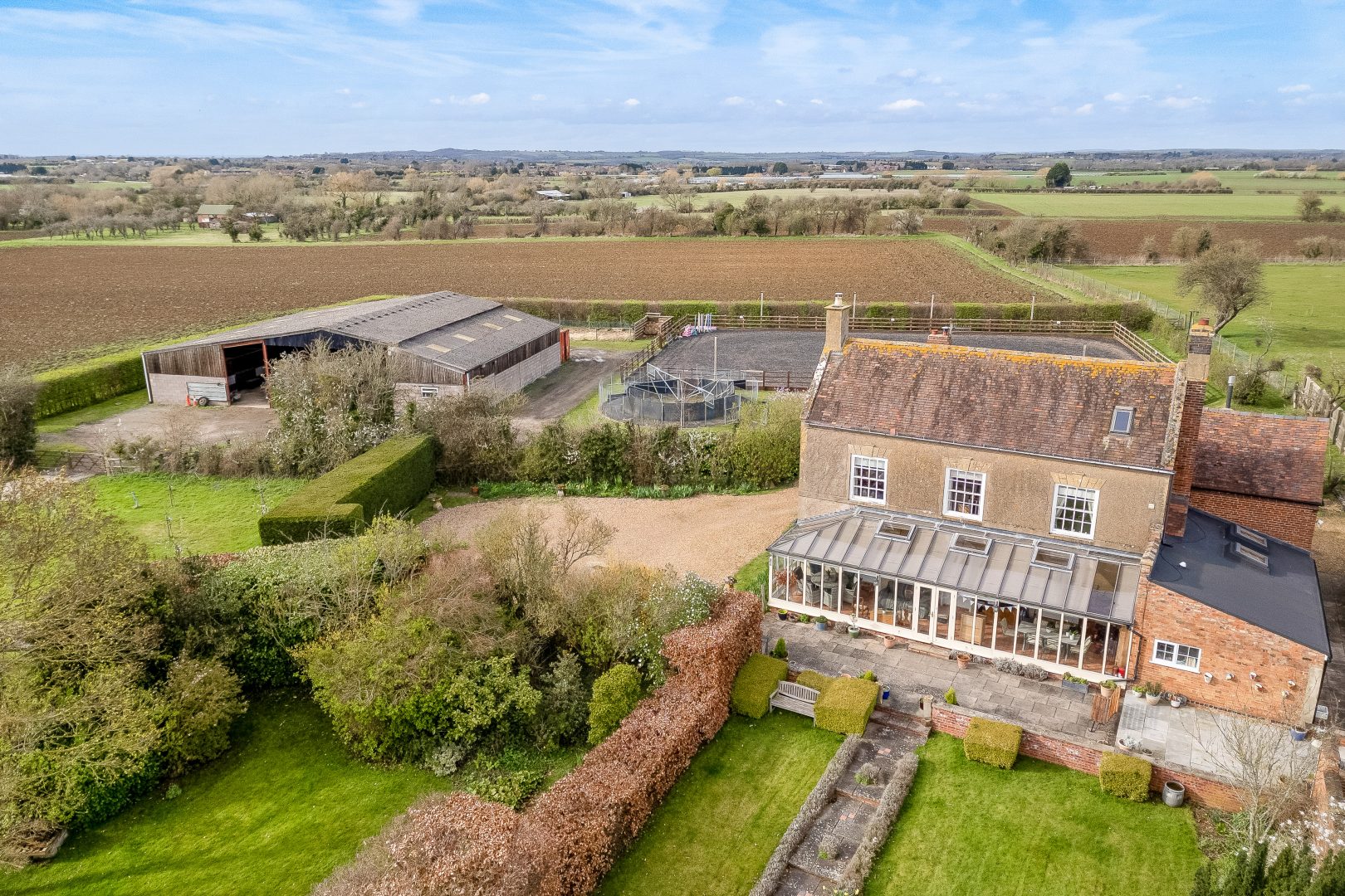 Check out this ideal equestrian home with arena, horsewalker and 32 acres
