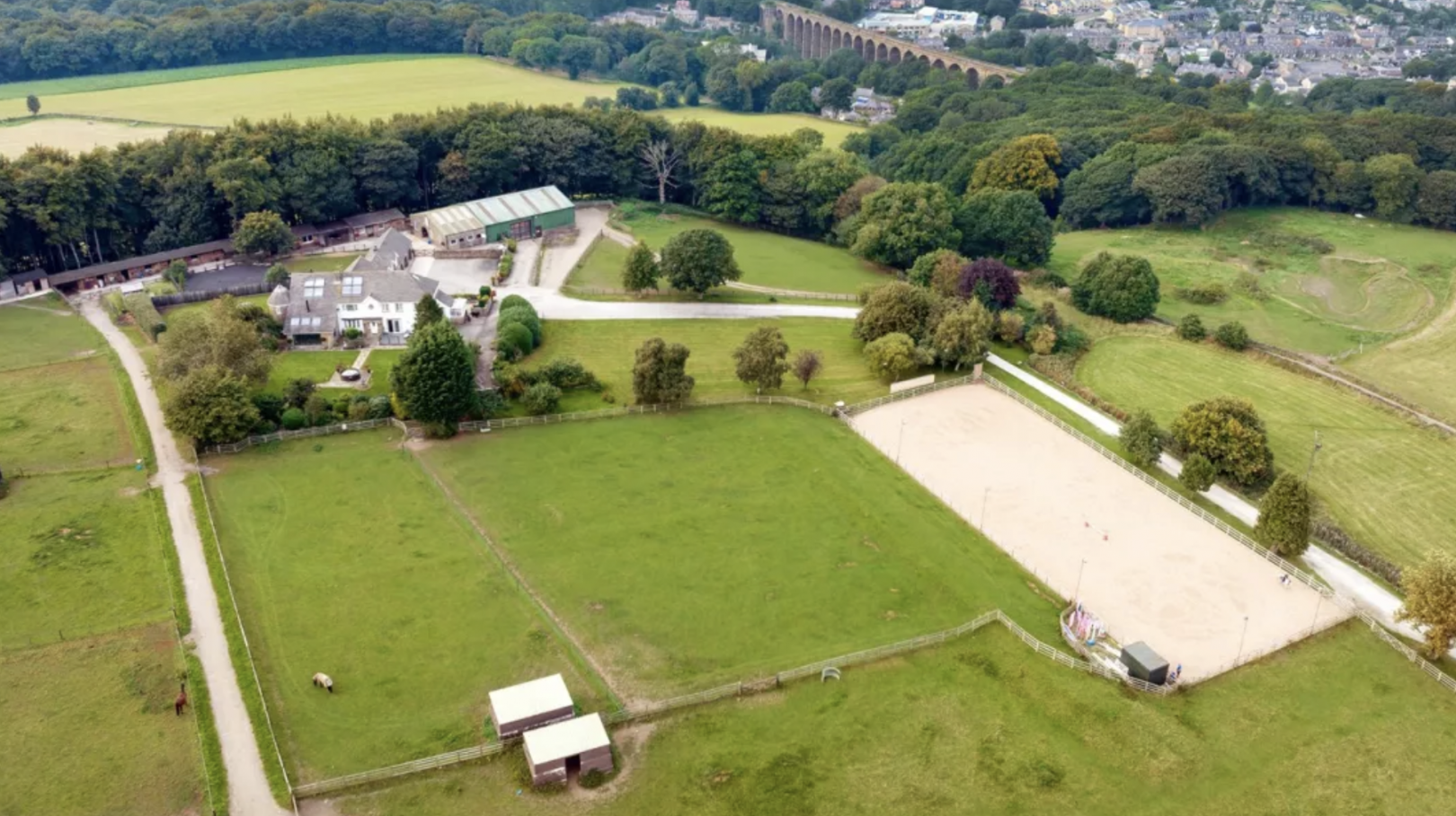 A large family home complete with 22 stables, arena, lots of grazing ...