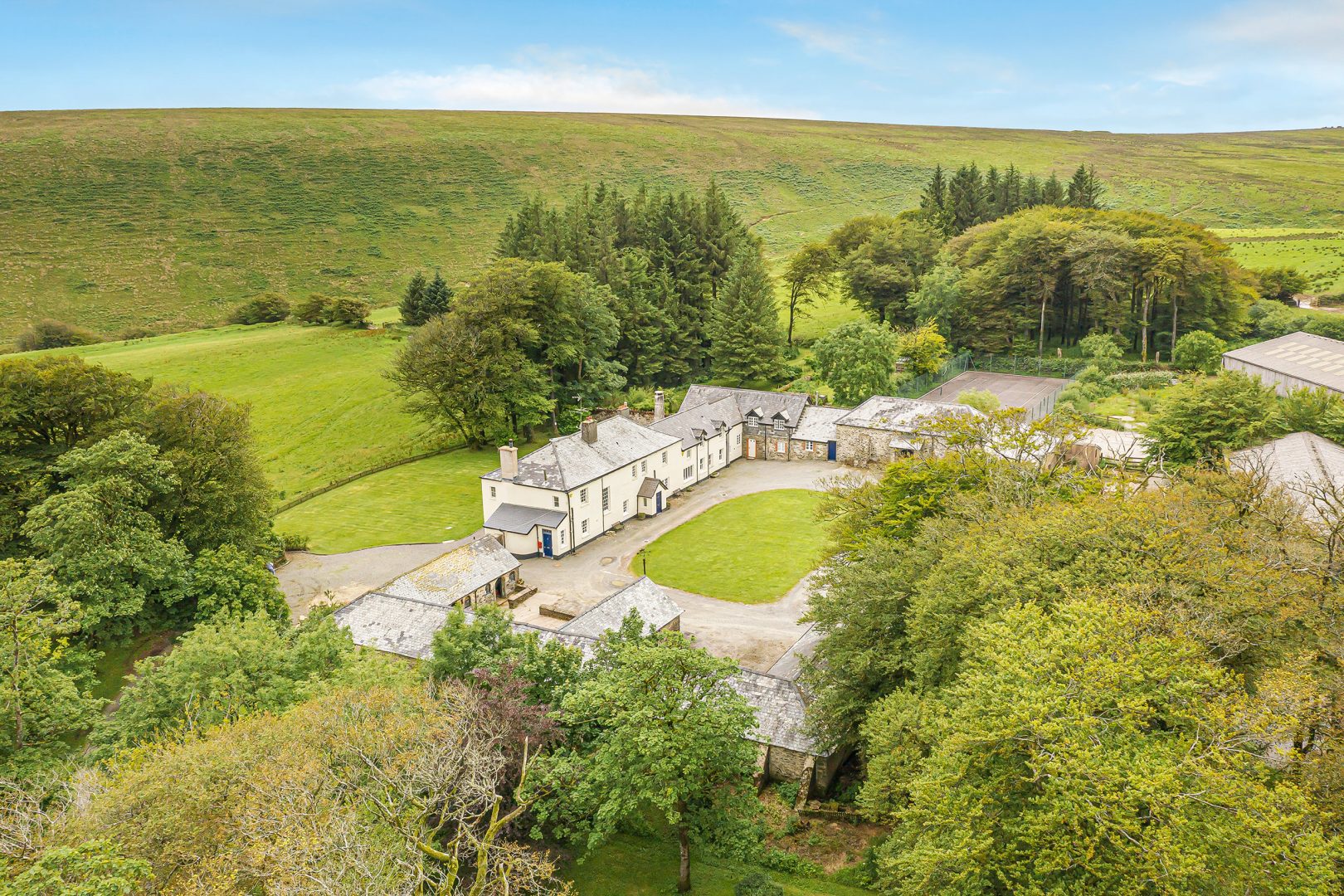 Equestrian home with 900 acres, stables and indoor school for sale