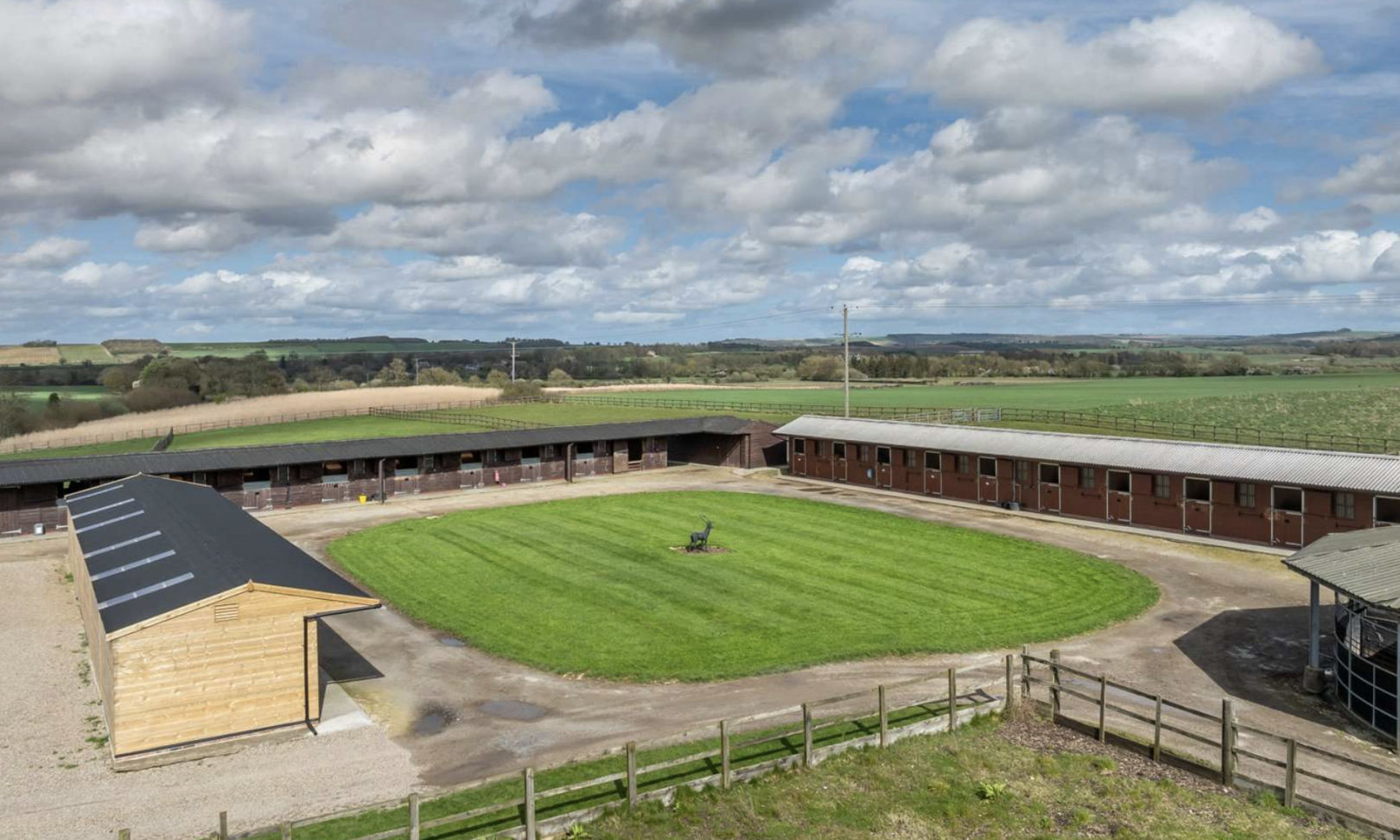 A mega equestrian set up with plenty of stables, plus a horsewalker ...