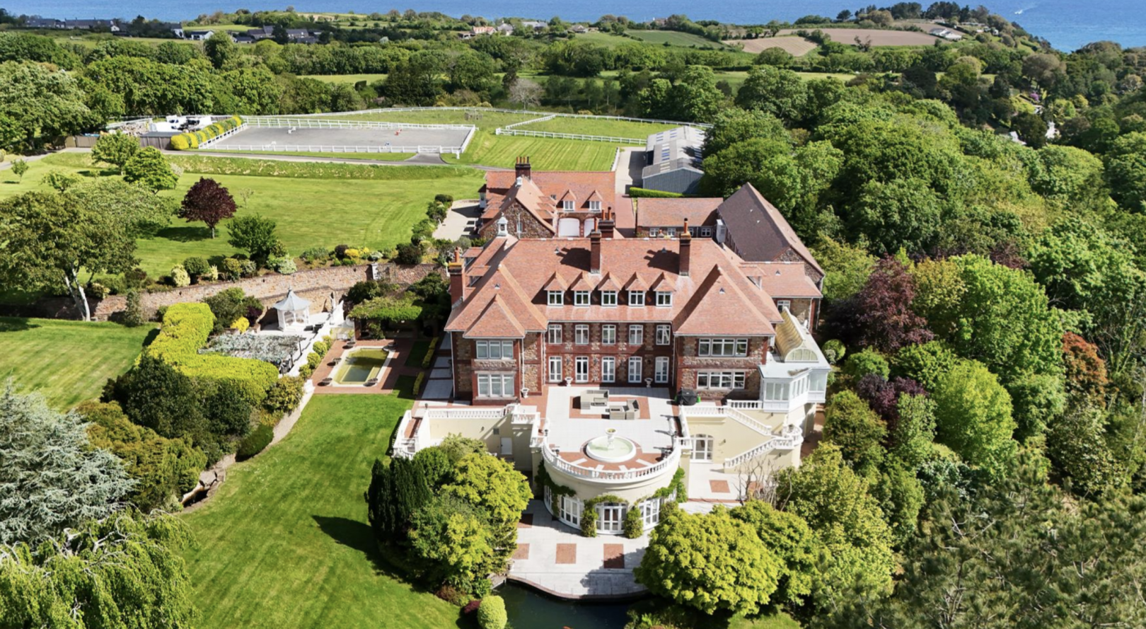 What a beauty! An impressive home with incredible views, two arenas ...