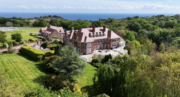 What a beauty! An impressive home with incredible views, two arenas ...