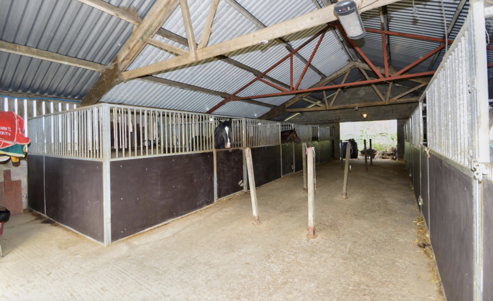 A family home in a lovely location, complete with arena, stables and 28 ...