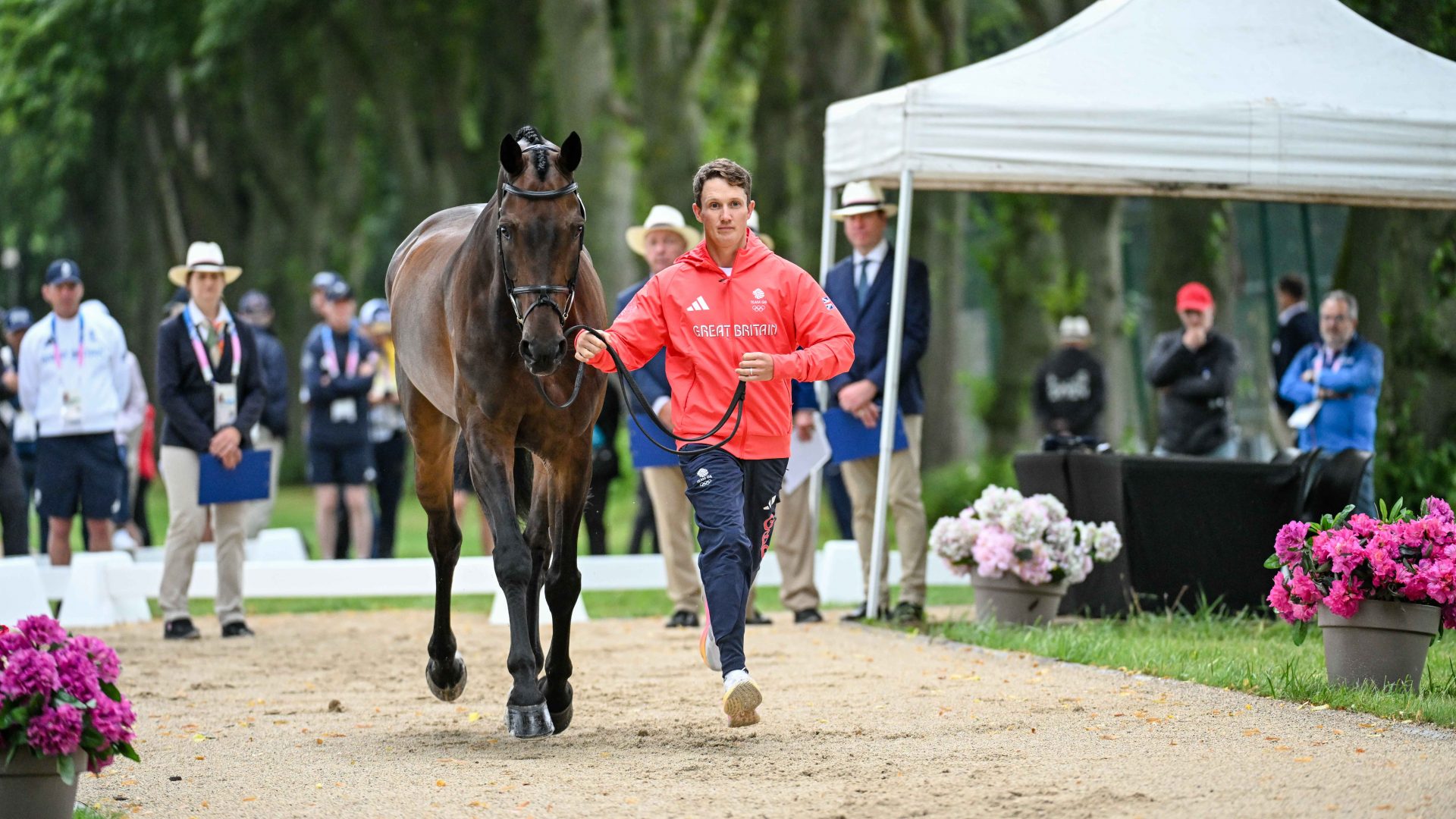 Olympic eventing first trot-up photos – suits, floaty dresses and coral ...