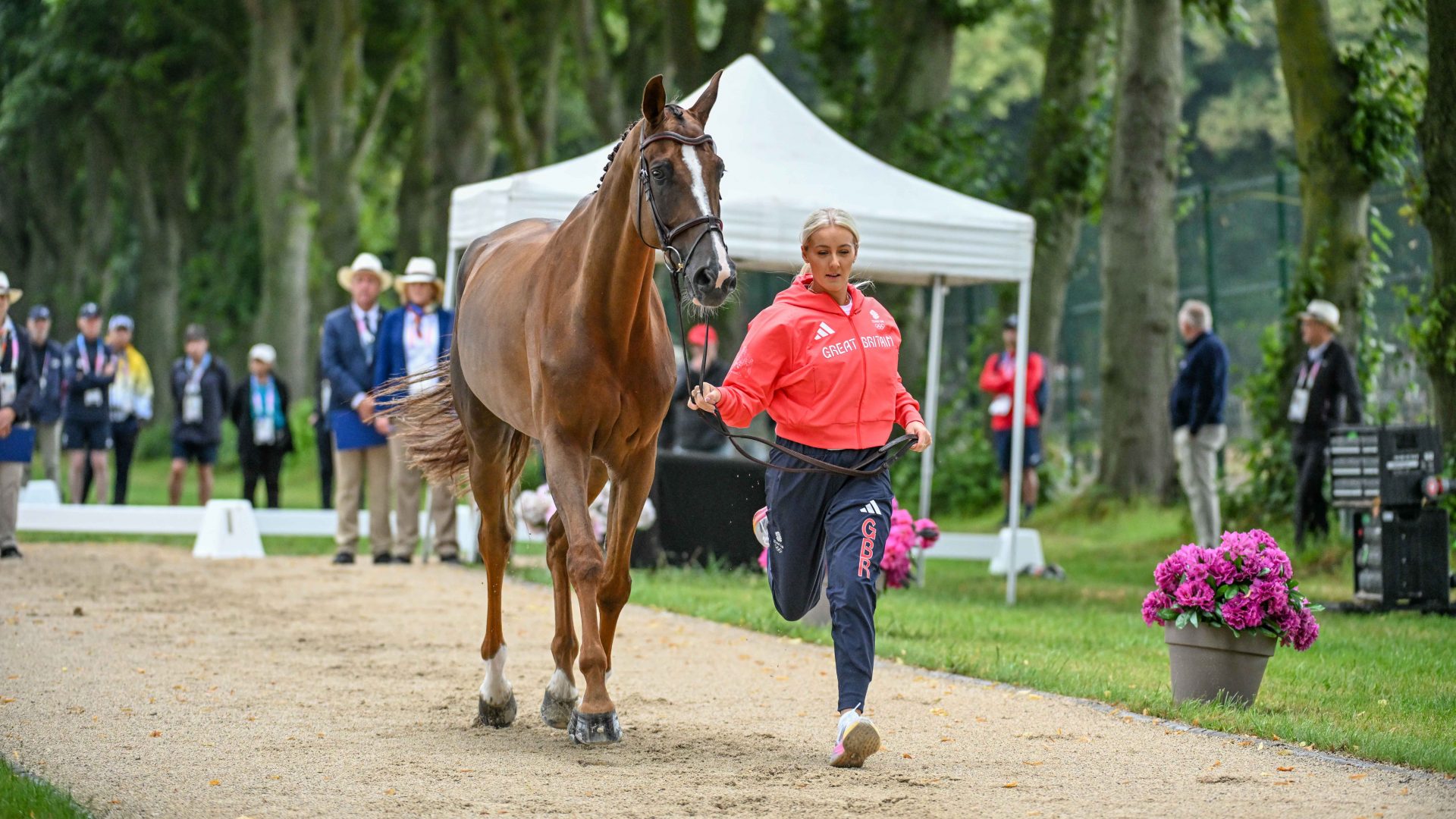 Olympic eventing first trot-up photos – suits, floaty dresses and coral ...