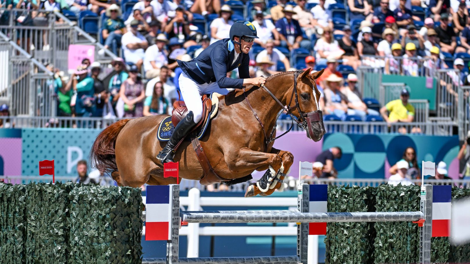 Henrik von Eckermann jumps clear in Olympic showjumping qualifier
