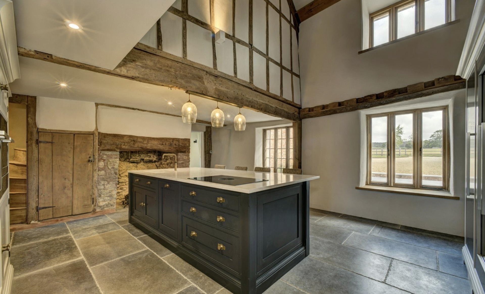 A stunning horsey home complete with stables, arena, grazing, pool and ...
