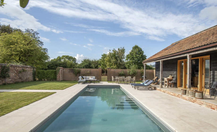 A stunning horsey home complete with stables, arena, grazing, pool and ...