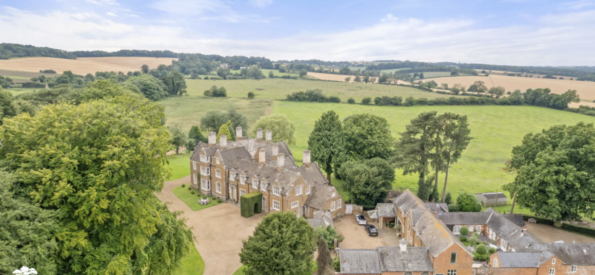 What a pad! A beautiful 10-bed home with 15 acres, stables and two self ...