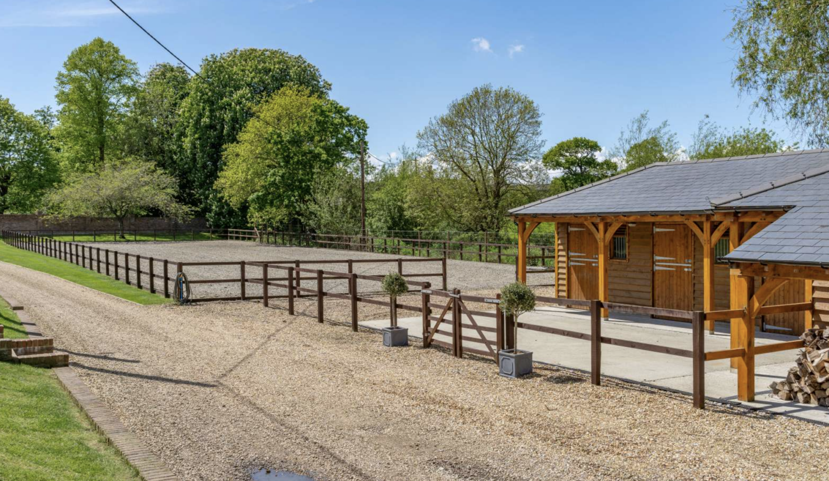A farmhouse steeped in history and beautifully updated with stables ...