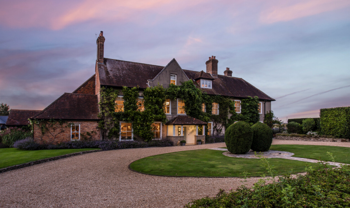 A farmhouse steeped in history and beautifully updated with stables ...