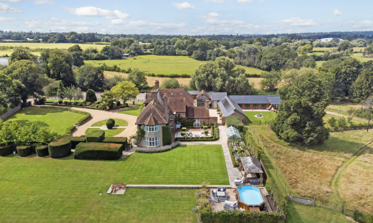 A farmhouse steeped in history and beautifully updated with stables ...