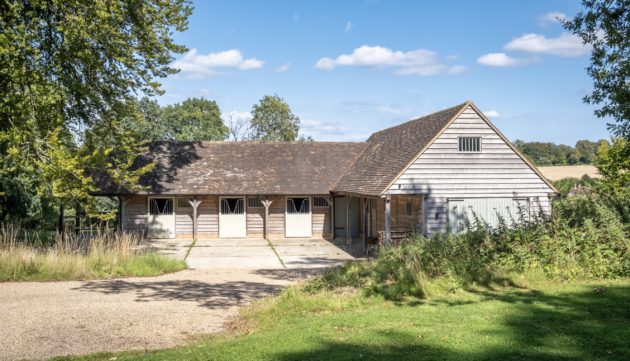 What a set-up! A simply gorgeous home, complete with 19 acres, stables ...