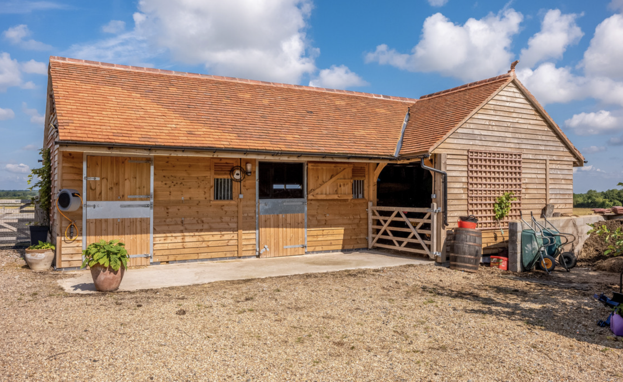 A seriously stylish family home with stables, arena and paddocks in a ...