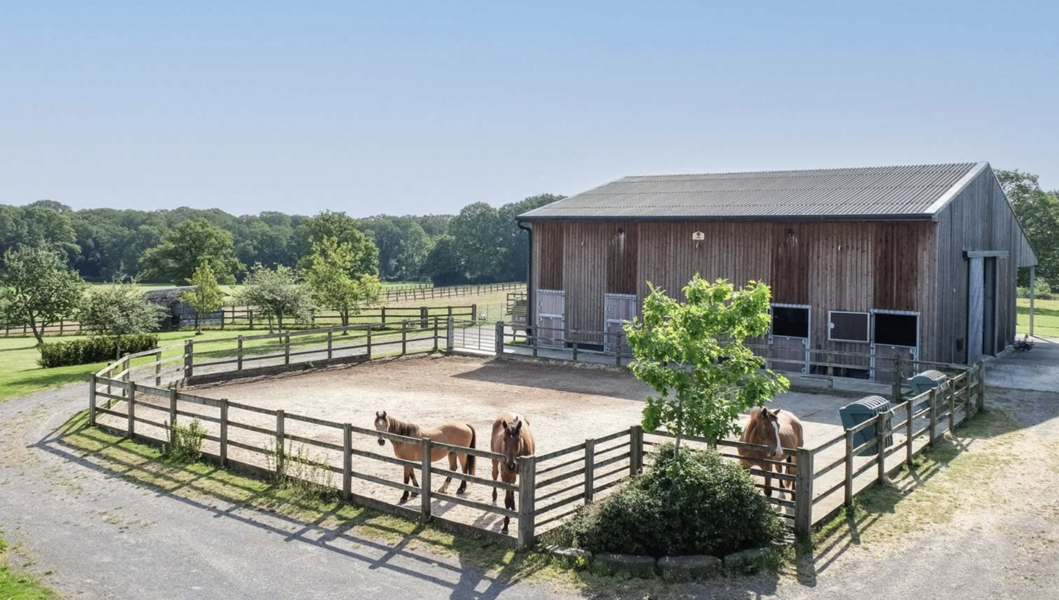 A stunning home with stables, arena, over 23 acres and off-road hacking ...