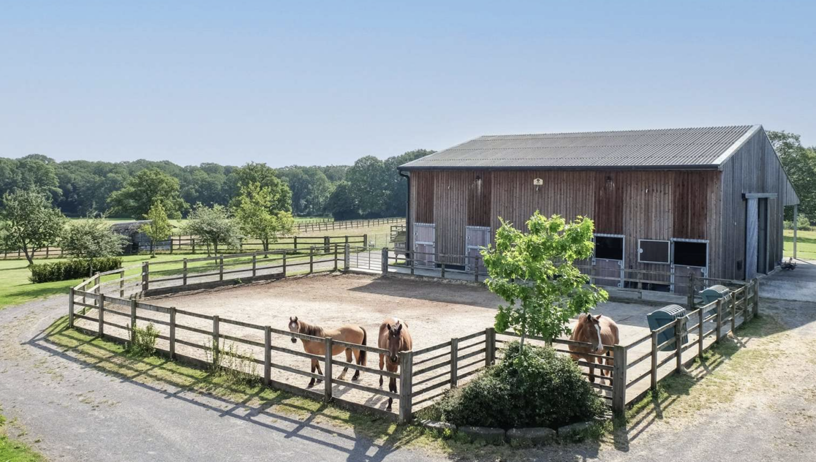 A stunning home with stables, arena, over 23 acres and off-road hacking ...