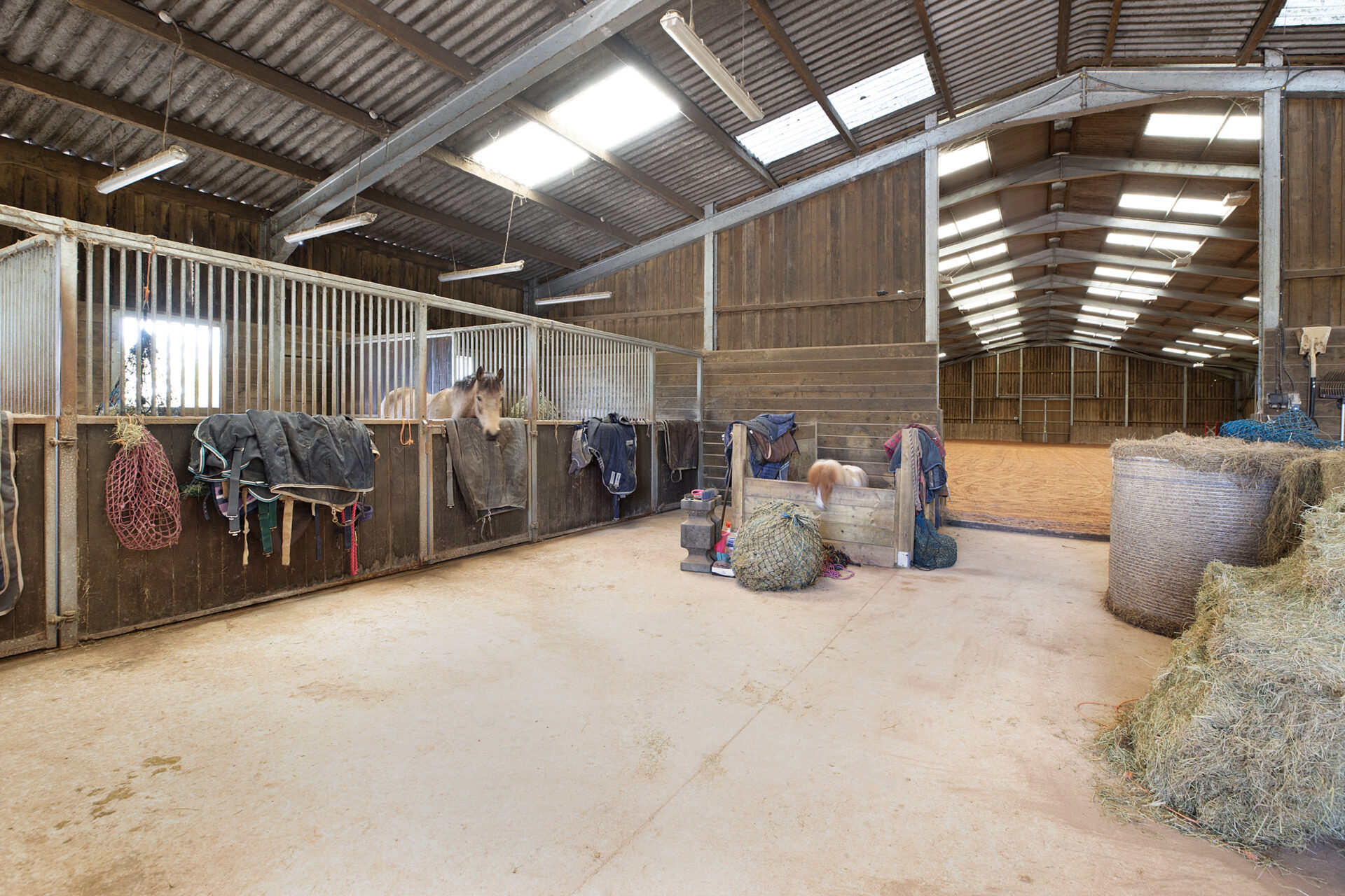 What a home! Check out this property, complete with stables, indoor ...