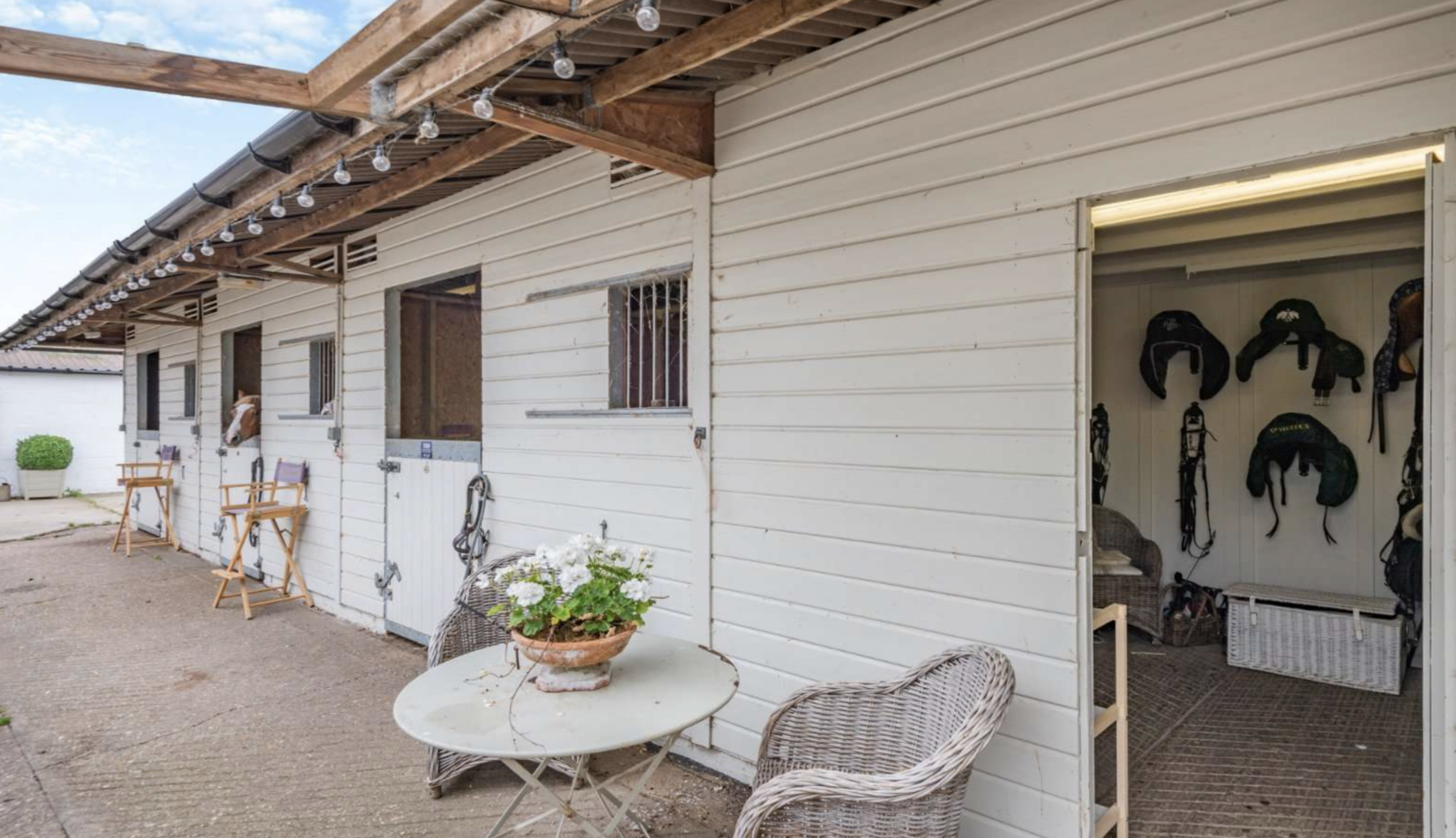 A beautifully presented country home with attractive stables, arena ...