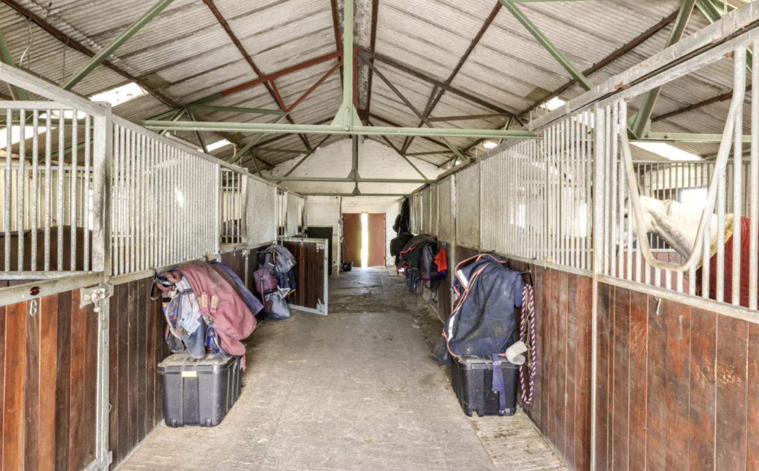 A lovely home complete with arena, stables, all-weather turnout ...