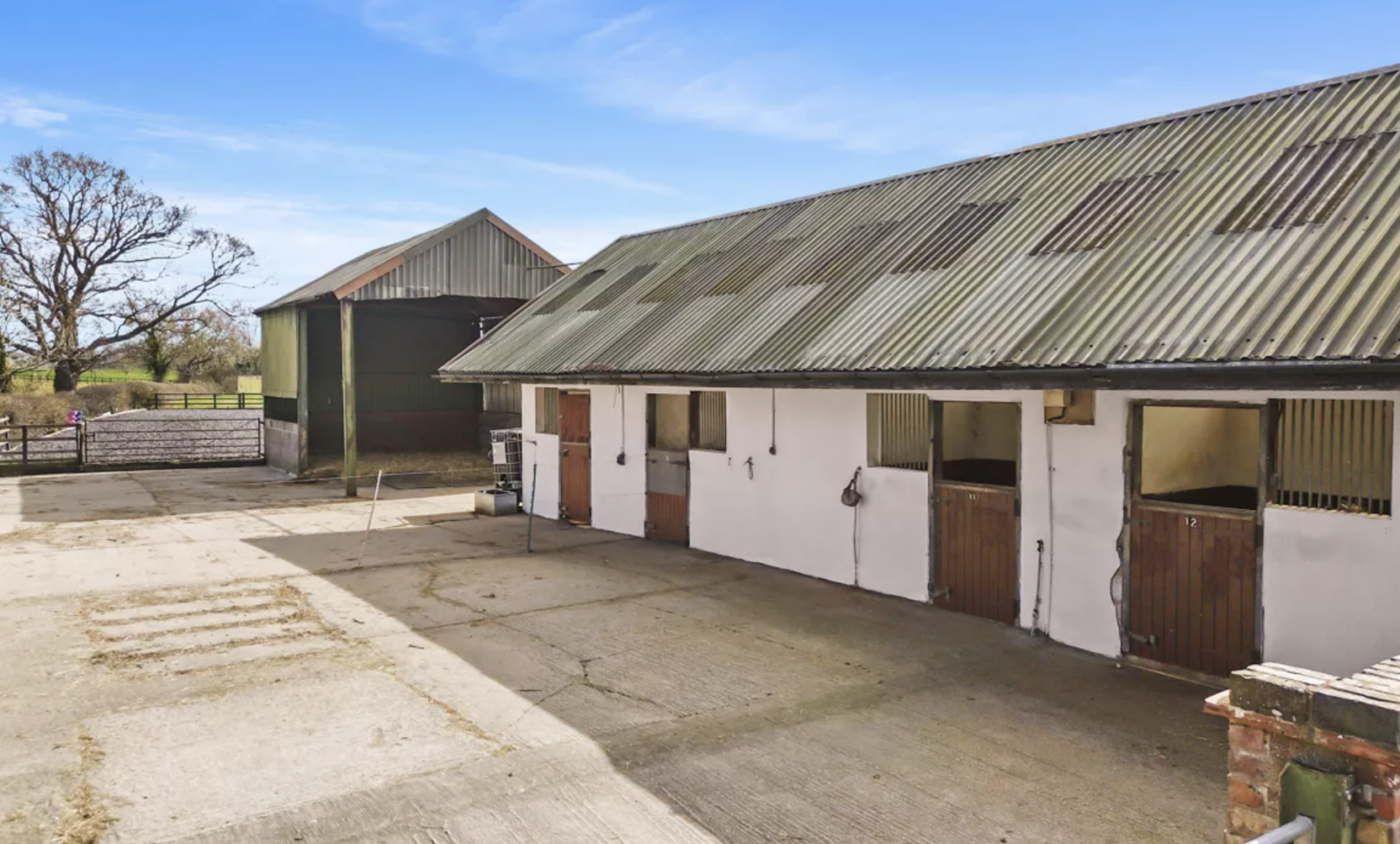 A lovely home complete with arena, stables, all-weather turnout ...