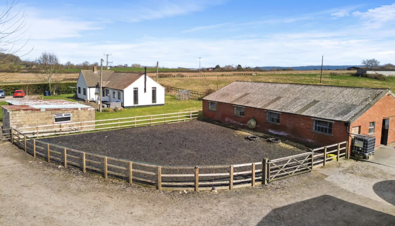 A lovely home complete with arena, stables, all-weather turnout ...