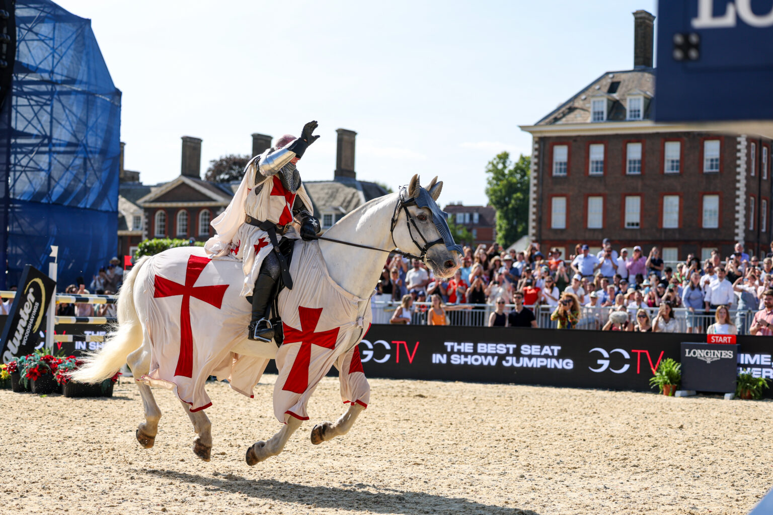 John Whitaker surprises fans dressed as knight in shining armour