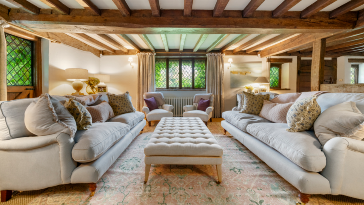 Horsey home with 18 acres, stables, an arena and an oast house annex
