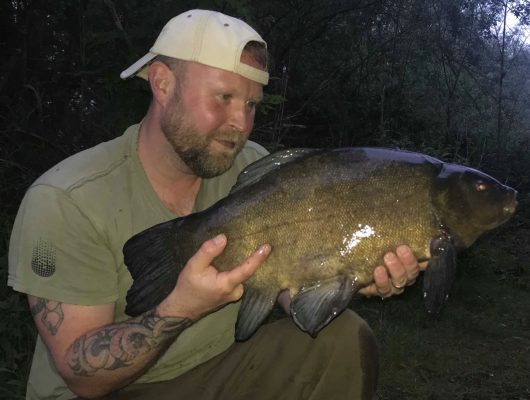 Male tench is one of the biggest ever caught on rod and line
