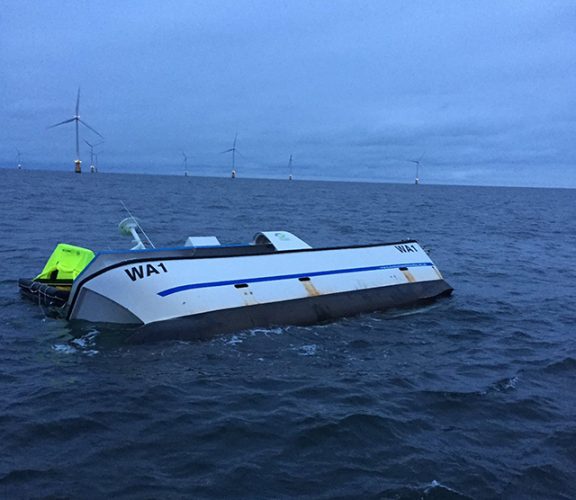Three rescued from sinking catamaran after wind turbine collision ...