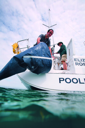 Heavy weather sailing techniques: how to protect your boat in storm ...