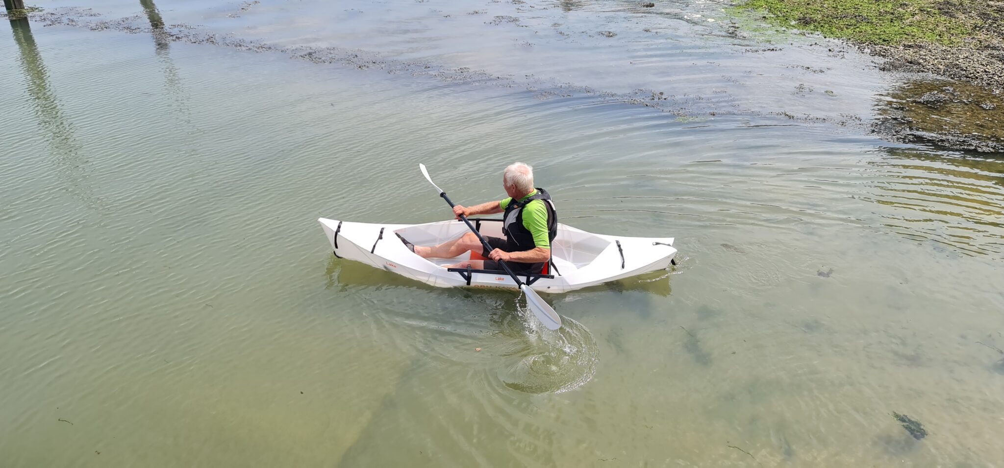 This crazy pack-away Kayak that folds down like a suitcase is a Black ...
