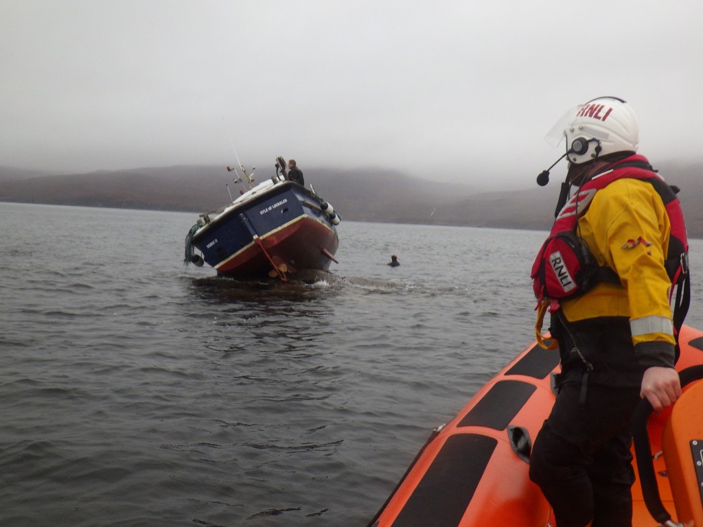 Three rescued after dive boat runs aground, sinks - YBW