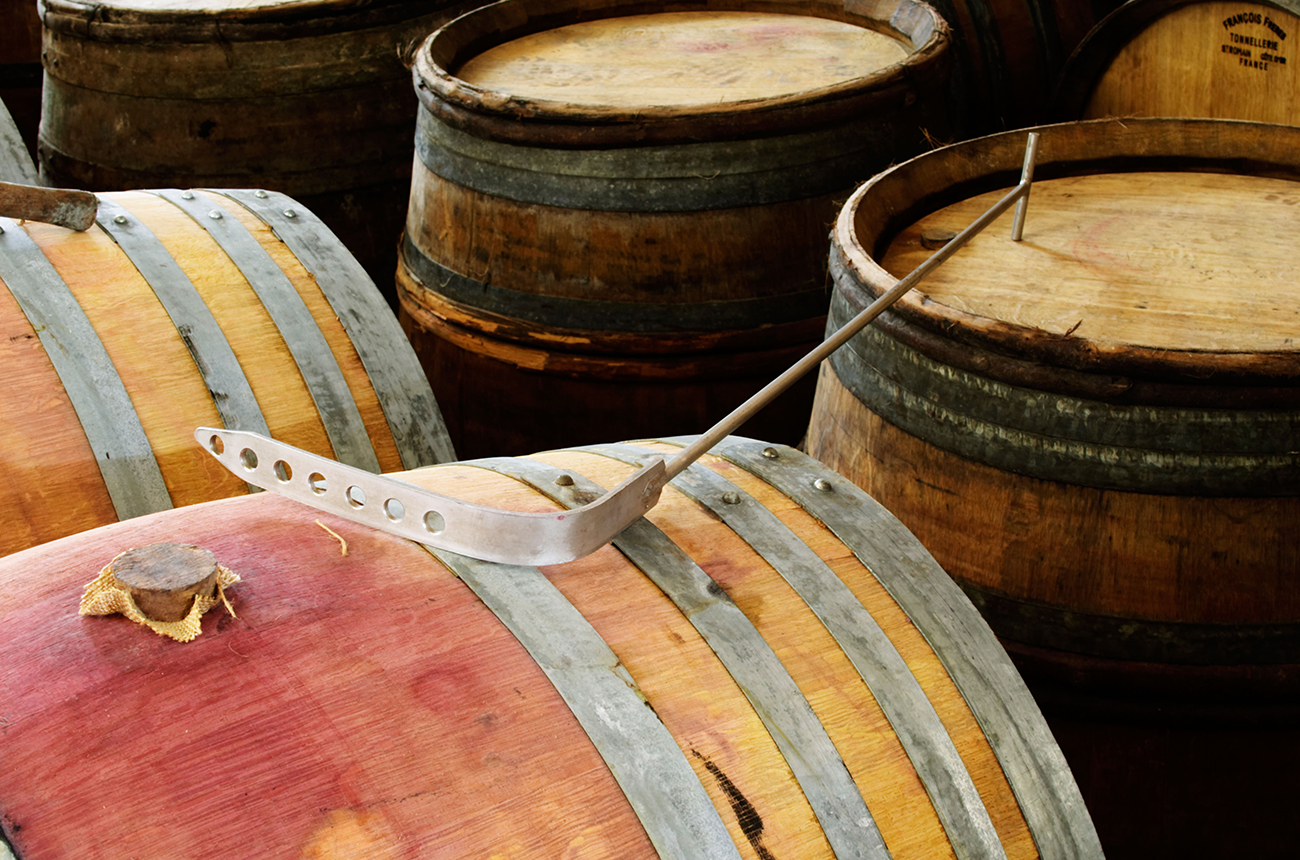 What is sur lie ageing, and what does it do to wine?