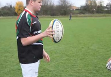 A video showing mini rugby players how to grip the ball
